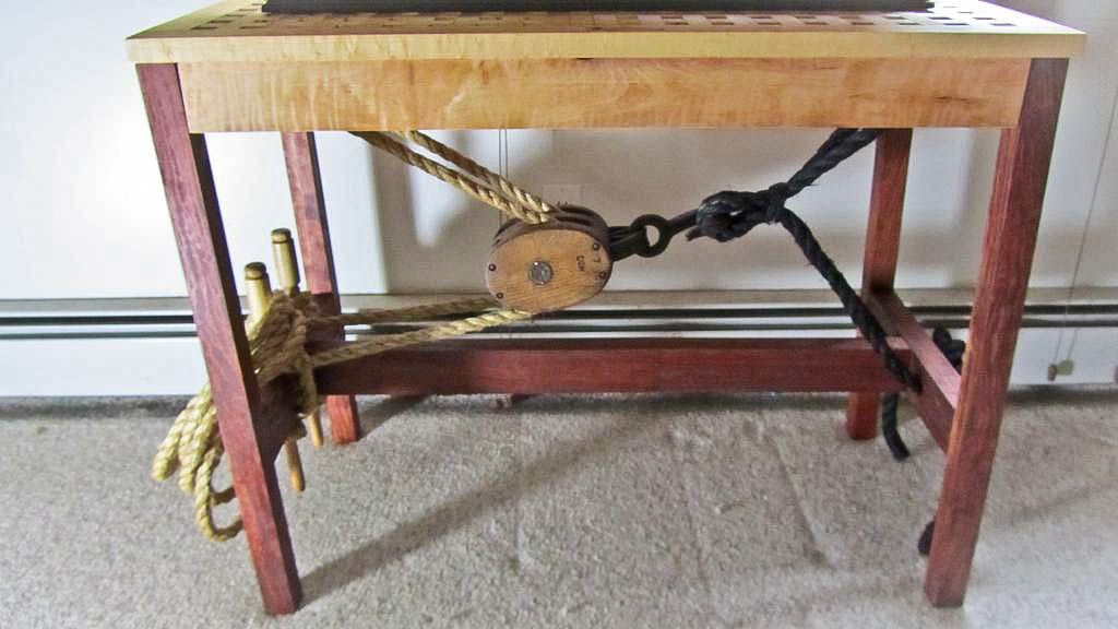 A nautical themed table to hold a ship model. - FineWoodworking