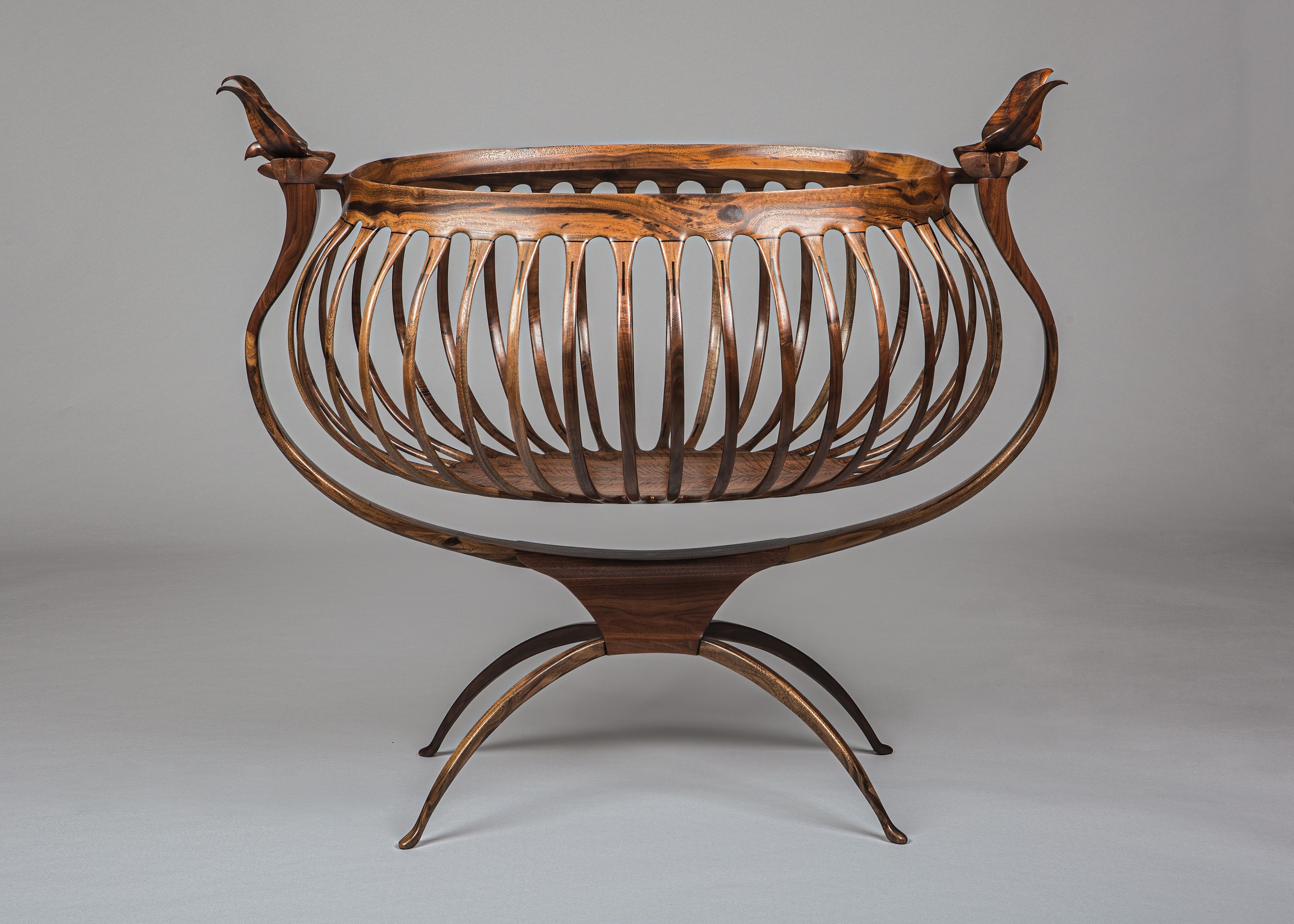 Steam Bent and Sculpted Baby Cradle with Carved Birds - FineWoodworking
