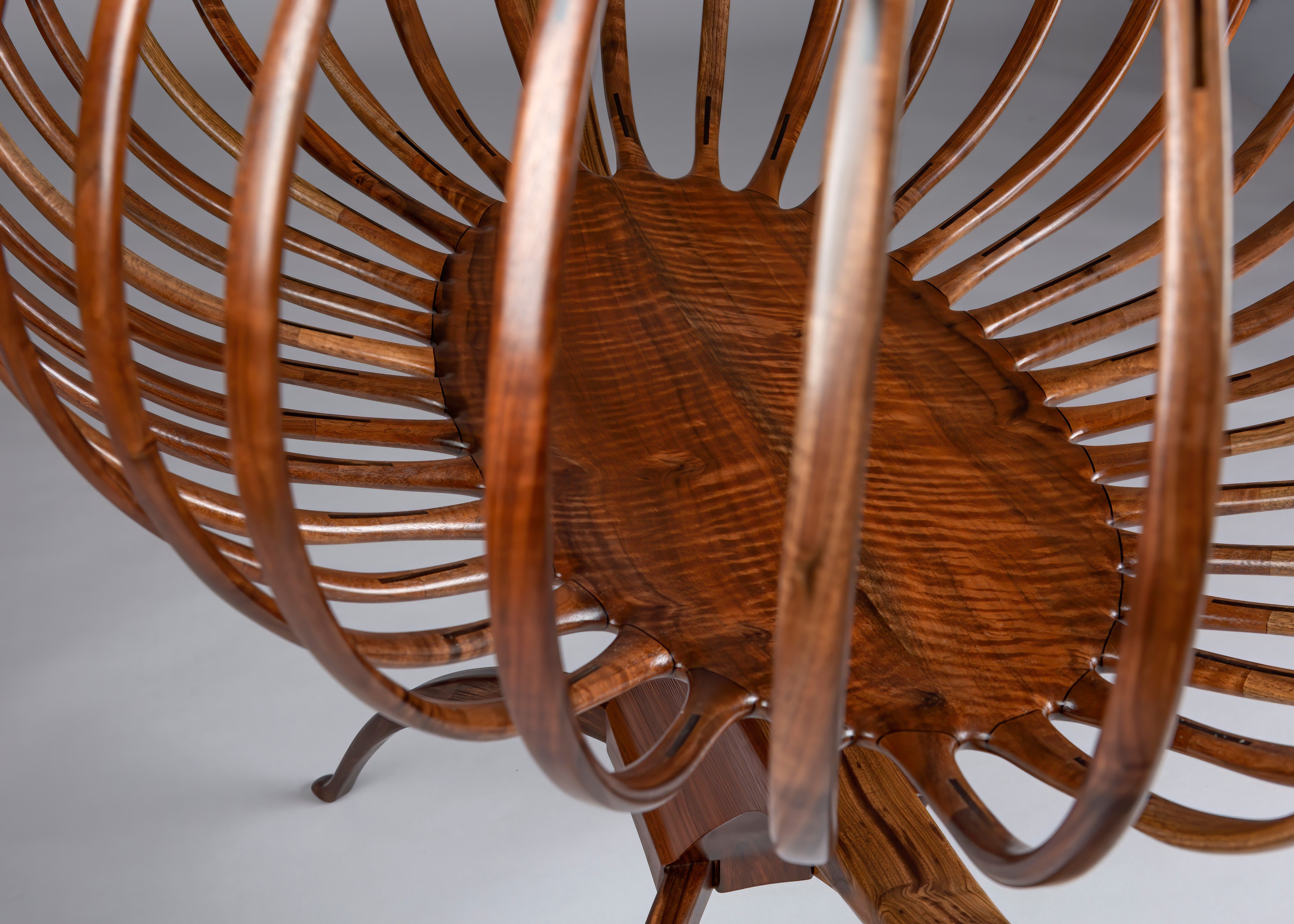 Steam Bent and Sculpted Baby Cradle with Carved Birds - FineWoodworking