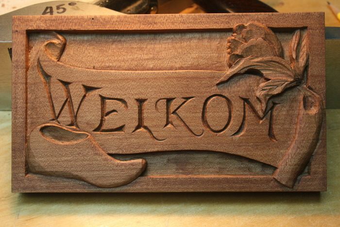 Carved door plaque - FineWoodworking