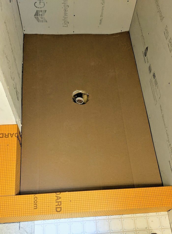 Protect the preformed shower pan - Fine Homebuilding